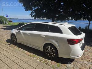 White Toyota Avensis 2015 in Riga, with an engine capacity of 1.60 L and mileage of 176 thousand km for 8190 €, photo 9 on AUTOMOTO.COM.LV