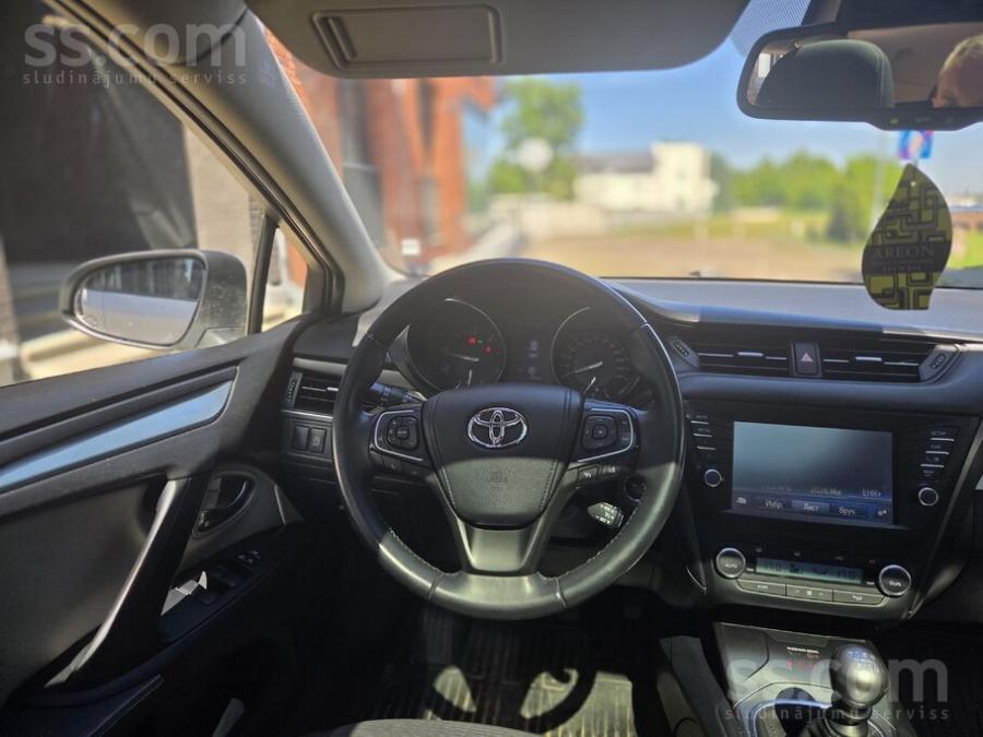 White Toyota Avensis 2015 in Riga, with an engine capacity of 1.60 L and mileage of 176 thousand km for 8190 €, photo 13 on AUTOMOTO.COM.LV