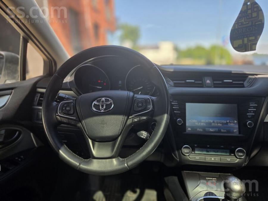 White Toyota Avensis 2015 in Riga, with an engine capacity of 1.60 L and mileage of 176 thousand km for 8190 €, photo 14 on AUTOMOTO.COM.LV