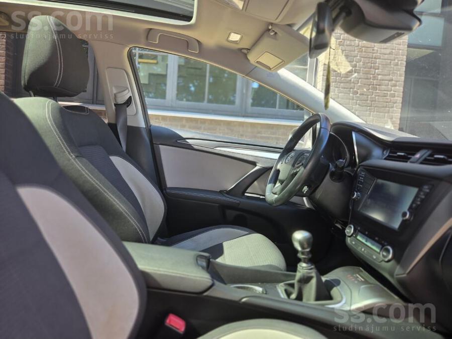 White Toyota Avensis 2015 in Riga, with an engine capacity of 1.60 L and mileage of 176 thousand km for 8190 €, photo 16 on AUTOMOTO.COM.LV