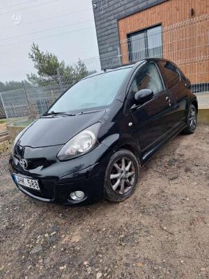 Black Toyota Aygo 2012 in Vilnius, with an engine capacity of 1.00 L and mileage of 107 thousand km for 1700 €, photo  on AUTOMOTO.COM.LV