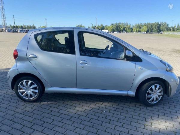 Grey Toyota Aygo 2007 in Marijampole, with an engine capacity of 1.00 L and mileage of 127 thousand km for 990 €, photo 8 on AUTOMOTO.COM.LV