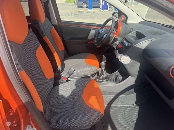 Toyota Aygo 2012 in Kaunas on AUTOMOTO.COM.LV Orange Toyota Aygo 2012 in Kaunas, with an engine capacity of 1.00 L and mileage of 121 thousand km for 3350 β¬, photo 7 on AUTOMOTO.COM.LV