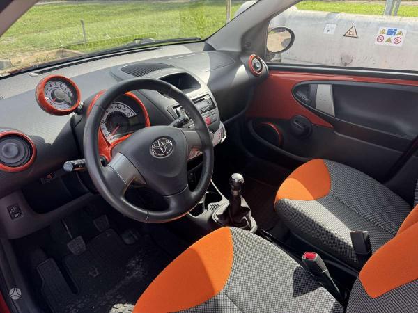 Toyota Aygo 2012 in Kaunas on AUTOMOTO.COM.LV Orange Toyota Aygo 2012 in Kaunas, with an engine capacity of 1.00 L and mileage of 121 thousand km for 3350 β¬, photo 8 on AUTOMOTO.COM.LV