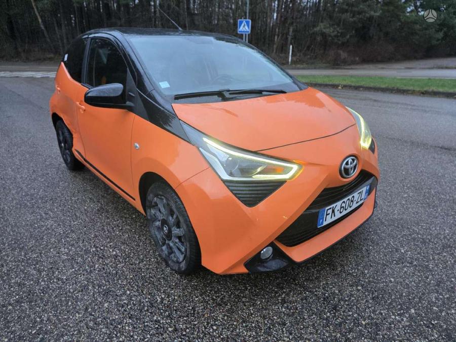 Orange Toyota Aygo 2019 in Anyksciai, with an engine capacity of 1.00 L and mileage of 59 thousand km for 4600 €, photo 3 on AUTOMOTO.COM.LV