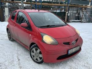 Red Toyota Aygo 2006 in Riga, with an engine capacity of 1.00 L and mileage of 0 thousand km for 690 €, photo 2 on AUTOMOTO.COM.LV