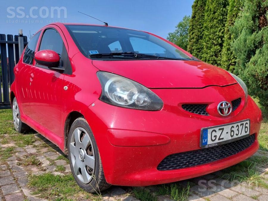 Red Toyota Aygo 2008 in Riga, with an engine capacity of 1.00 L and mileage of 115 thousand km for 500 €, photo 1 on AUTOMOTO.COM.LV