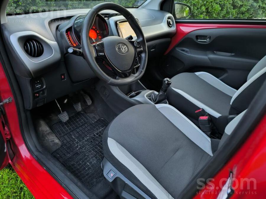 Red Toyota Aygo 2018 in Riga, with an engine capacity of 1.00 L and mileage of 225 thousand km for 5155 €, photo 6 on AUTOMOTO.COM.LV
