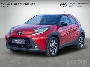 Red Toyota Aygo 2024 in Riga, with an engine capacity of 1.00 L and mileage of 12 thousand km for 16990 €, photo  on AUTOMOTO.COM.LV
