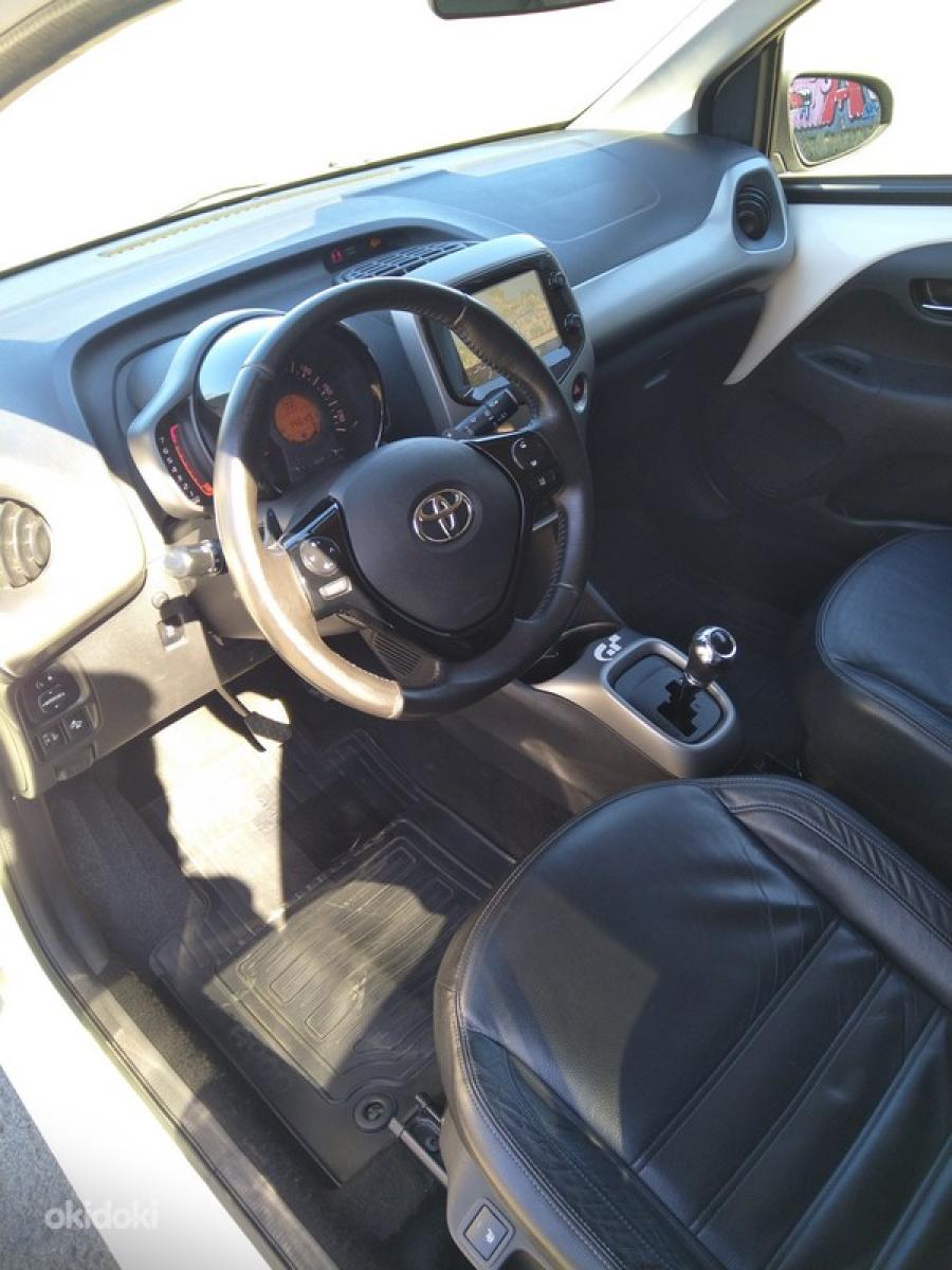 Balts Toyota Aygo 2016 Tallina, ar dzinēja tilpumu 1.00 L un nobraukumu 152 tūkst. km par 10990 €, foto 21 vietnē AUTOMOTO.COM.LV