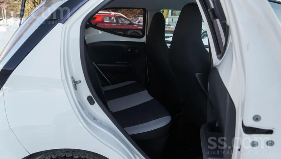 White Toyota Aygo 2017 in Riga, with an engine capacity of 1.00 L and mileage of 65 thousand km for 6850 €, photo 9 on AUTOMOTO.COM.LV