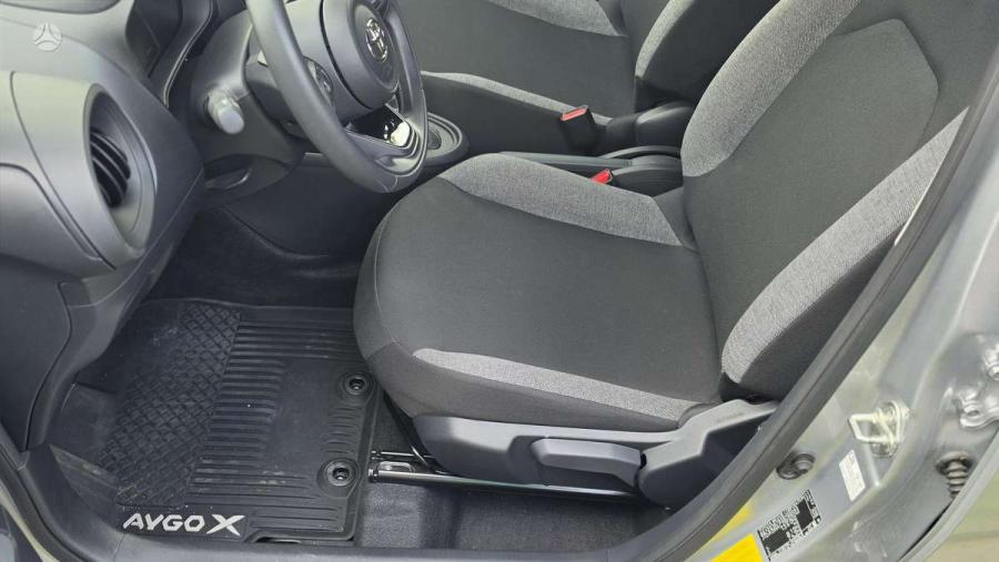 Grey Toyota Aygo X 2023 in Klaipeda, with an engine capacity of 1.00 L and mileage of 10 thousand km for 15900 €, photo 16 on AUTOMOTO.COM.LV