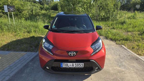 Red Toyota Aygo X 2025 in Panevezys, with an engine capacity of 1.00 L and mileage of 1 thousand km for 12500 €, photo 1 on AUTOMOTO.COM.LV