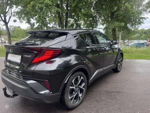 Black Toyota C-HR 2022 in Alytus, with an engine capacity of 1.80 L and mileage of 180 thousand km for 18600 €, photo 11 on AUTOMOTO.COM.LV