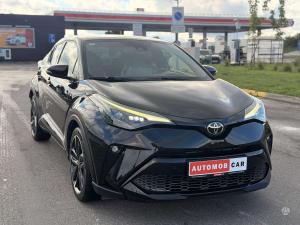 Black Toyota C-HR 2022 in Vilnius, with an engine capacity of 1.99 L and mileage of 50 thousand km for 24350 €, photo 4 on AUTOMOTO.COM.LV