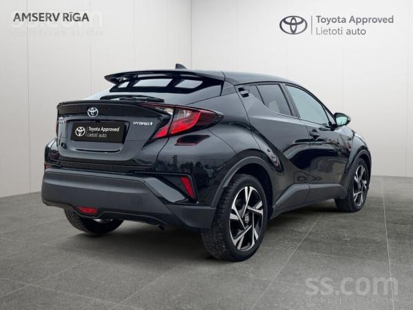 Black Toyota C-HR 2023 in Riga, with an engine capacity of 1.80 L and mileage of 49 thousand km for 22900 €, photo 2 on AUTOMOTO.COM.LV
