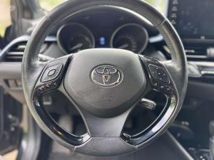 Black Toyota C-HR 2021 in Kaunas, with an engine capacity of 1.80 L and mileage of 70 thousand km for 14600 €, photo 13 on AUTOMOTO.COM.LV