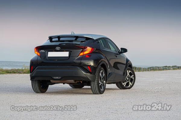 Black Toyota C-HR 2023 in Tallinn, with an engine capacity of 1.80 L and mileage of 26 thousand km for 28500 €, photo 3 on AUTOMOTO.COM.LV