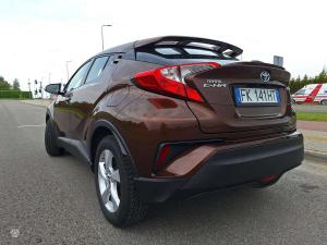 Brown Toyota C-HR 2017 in Klaipeda, with an engine capacity of 1.80 L and mileage of 115 thousand km for 16888 €, photo 4 on AUTOMOTO.COM.LV