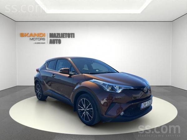 Toyota C-HR 2017 Rīga vietnē Brūns Toyota C-HR 2017 Rīga, ar dzinēja tilpumu 1.20 L un nobraukumu 91 tūkst. km par 14990 €, foto 9 vietnē AUTOMOTO.COM.LV