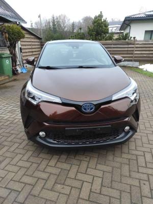 Brown Toyota C-HR 2019 in Kaunas, with an engine capacity of 1.80 L and mileage of 112 thousand km for 16450 €, photo 18 on AUTOMOTO.COM.LV
