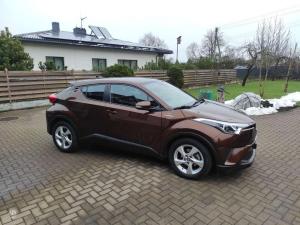 Brown Toyota C-HR 2019 in Kaunas, with an engine capacity of 1.80 L and mileage of 112 thousand km for 16450 €, photo 19 on AUTOMOTO.COM.LV