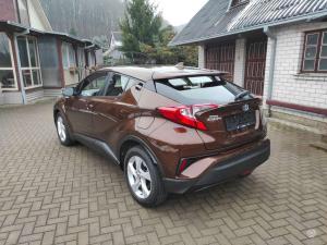 Brown Toyota C-HR 2019 in Kaunas, with an engine capacity of 1.80 L and mileage of 112 thousand km for 16450 €, photo 20 on AUTOMOTO.COM.LV