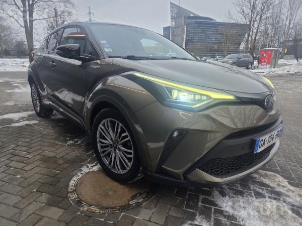 Brown Toyota C-HR 2021 in Riga, with an engine capacity of 2.00 L and mileage of 0 thousand km for 17900 €, photo 4 on AUTOMOTO.COM.LV