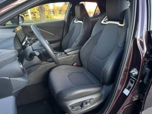 Brown Toyota C-HR 2024 in Riga, with an engine capacity of 1.80 L and mileage of 15 thousand km for 32100 €, photo 13 on AUTOMOTO.COM.LV