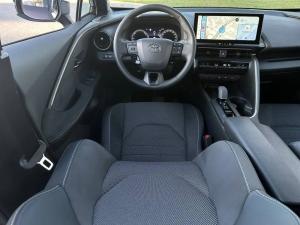 Brown Toyota C-HR 2024 in Riga, with an engine capacity of 1.80 L and mileage of 15 thousand km for 32100 €, photo 15 on AUTOMOTO.COM.LV