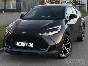 Brūns Toyota C-HR 2024 Rīga, ar dzinēja tilpumu 1.80 L un nobraukumu 15 tūkst. km par 31700 €, foto  vietnē AUTOMOTO.COM.LV