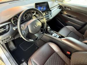 Grey Toyota C-HR 2017 in Panevezys, with an engine capacity of 1.80 L and mileage of 98 thousand km for 16400 €, photo 13 on AUTOMOTO.COM.LV