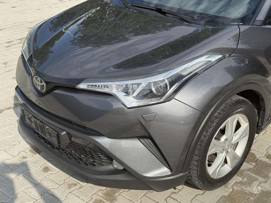 Grey Toyota C-HR 2017 in Utena, with an engine capacity of 1.20 L and mileage of 162 thousand km for 11600 €, photo 13 on AUTOMOTO.COM.LV