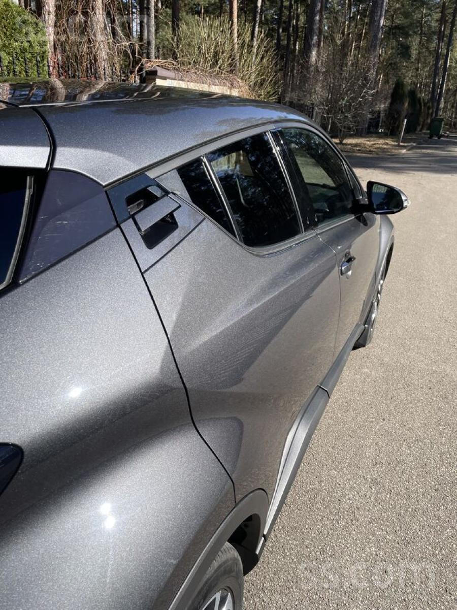 Pelēks Toyota C-HR 2021 Rīga, ar dzinēja tilpumu 1.80 L un nobraukumu 88 tūkst. km par 20000 €, foto 6 vietnē AUTOMOTO.COM.LV