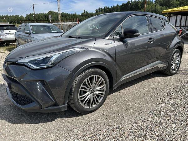 Grey Toyota C-HR 2021 in Vilnius, with an engine capacity of 1.99 L and mileage of 94 thousand km for 22300 €, photo 1 on AUTOMOTO.COM.LV