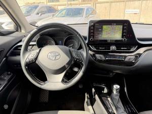 Grey Toyota C-HR 2021 in Vilnius, with an engine capacity of 1.80 L and mileage of 85 thousand km for 18300 €, photo 18 on AUTOMOTO.COM.LV