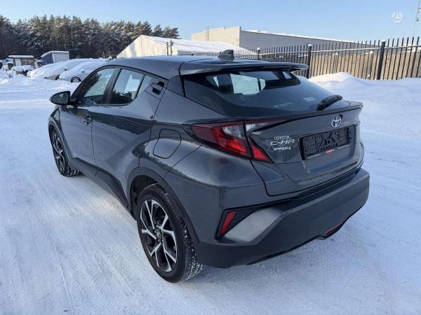 Grey Toyota C-HR 2022 in Vilnius, with an engine capacity of 1.80 L and mileage of 82 thousand km for 21950 €, photo 7 on AUTOMOTO.COM.LV