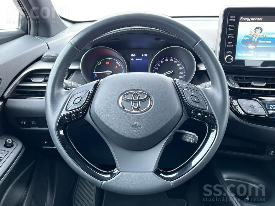Grey Toyota C-HR 2023 in Riga, with an engine capacity of 1.80 L and mileage of 65 thousand km for 21990 €, photo 12 on AUTOMOTO.COM.LV