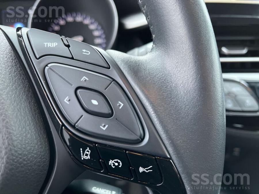 Grey Toyota C-HR 2023 in Riga, with an engine capacity of 1.80 L and mileage of 65 thousand km for 21990 €, photo 18 on AUTOMOTO.COM.LV