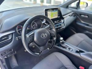 Grey Toyota C-HR 2023 in Vilnius, with an engine capacity of 1.80 L and mileage of 142 thousand km for 19950 €, photo 20 on AUTOMOTO.COM.LV