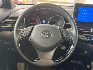 Grey Toyota C-HR 2023 in Siauliai, with an engine capacity of 1.80 L and mileage of 26 thousand km for 23500 €, photo 16 on AUTOMOTO.COM.LV