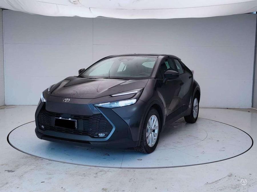 Grey Toyota C-HR 2024 in Kaunas, with an engine capacity of 1.99 L and mileage of 31 thousand km for 27900 €, photo 1 on AUTOMOTO.COM.LV