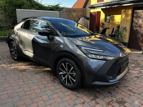 Grey Toyota C-HR 2024 in Prienai, with an engine capacity of 1.80 L and mileage of 1 thousand km for 29500 €, photo 1 on AUTOMOTO.COM.LV