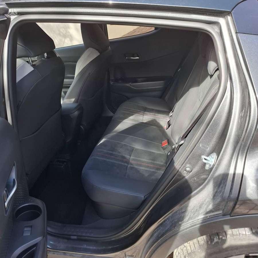 Grey Toyota C-HR 2021 in Kursenai, with an engine capacity of 1.99 L and mileage of 79 thousand km for 24499 €, photo 11 on AUTOMOTO.COM.LV