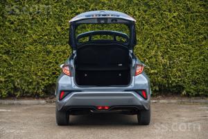 Grey Toyota C-HR 2023 in Riga, with an engine capacity of 1.80 L and mileage of 57 thousand km for 20850 €, photo 8 on AUTOMOTO.COM.LV