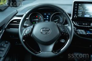 Grey Toyota C-HR 2023 in Riga, with an engine capacity of 1.80 L and mileage of 57 thousand km for 20850 €, photo 27 on AUTOMOTO.COM.LV