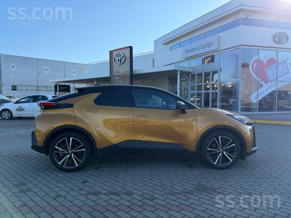 Orange Toyota C-HR 2025 in Liepaja, with an engine capacity of 1.80 L and mileage of 21 thousand km for 36200 €, photo 6 on AUTOMOTO.COM.LV
