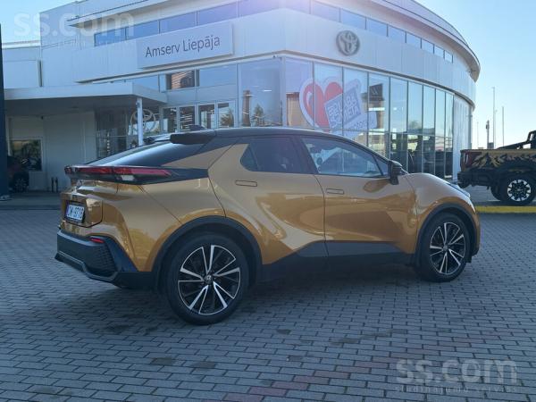 Orange Toyota C-HR 2025 in Liepaja, with an engine capacity of 1.80 L and mileage of 21 thousand km for 36200 €, photo 7 on AUTOMOTO.COM.LV