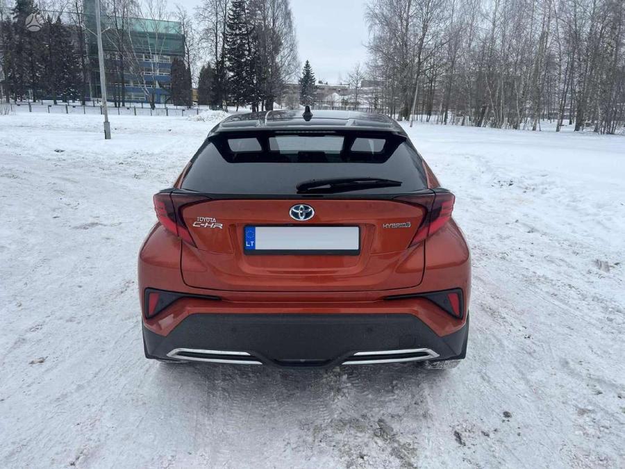 Orange Toyota C-HR 2021 in Panevezys, with an engine capacity of 1.99 L and mileage of 80 thousand km for 25000 €, photo 5 on AUTOMOTO.COM.LV