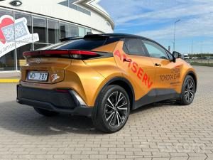 Orange Toyota C-HR 2025 in Liepaja, with an engine capacity of 1.80 L and mileage of 21 thousand km for 36600 €, photo 7 on AUTOMOTO.COM.LV